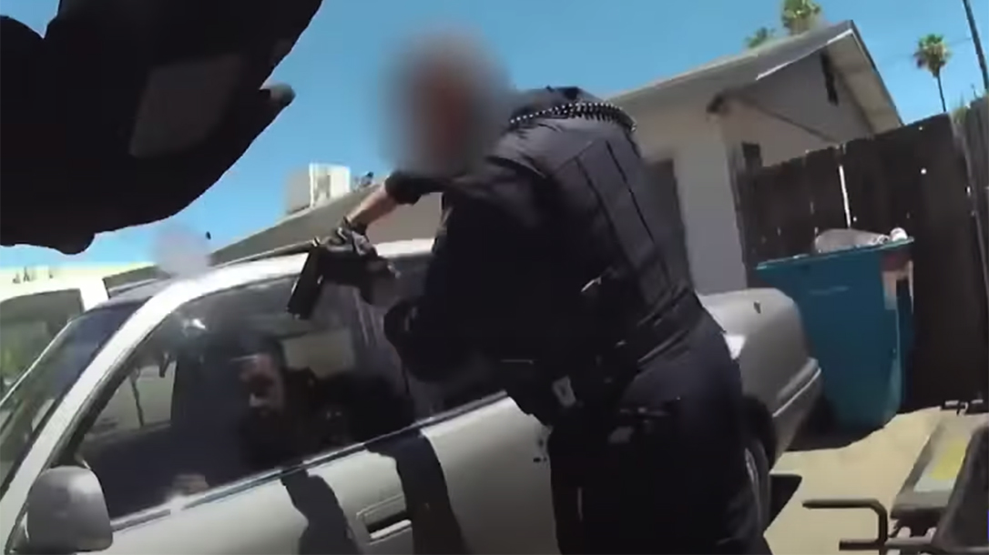 WATCH: Phoenix Police Shoot Armed Suspect Through Car Window